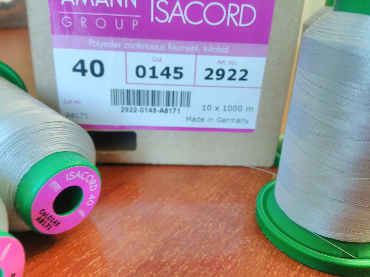 Нитки вышивальные AMANN ISACORD 40/1000м светло-серый 0145 (ID ...