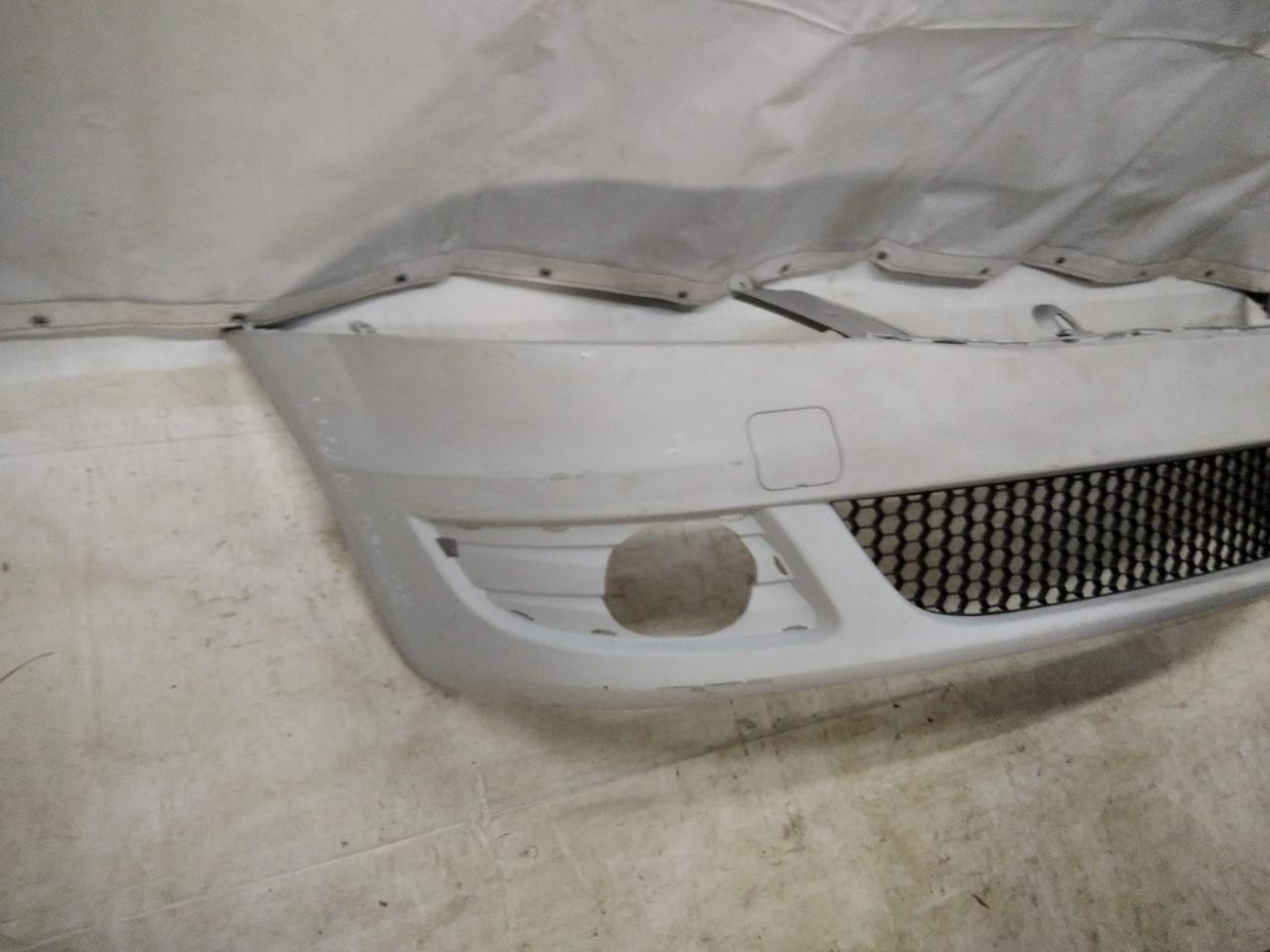 Купити Бампер передній Dacia Logan (2008-2012) Оригінал з гратами є ...