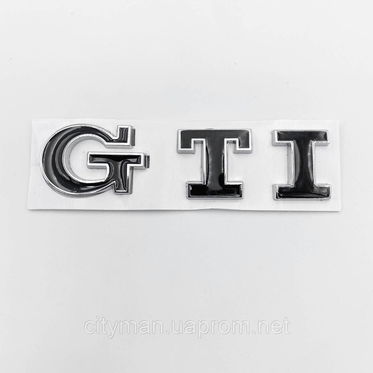 Эмблема наклейка GTI VW (Фольцваген) 93x26 мм Черный хром ободок, цена ...
