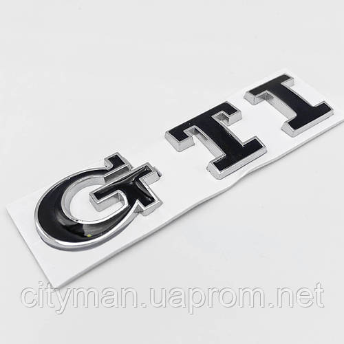 Эмблема наклейка GTI VW (Фольцваген) 93x26 мм Черный хром ободок, цена ...