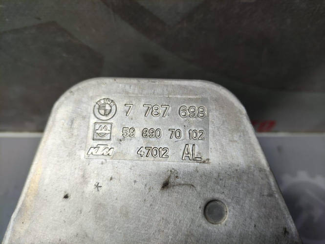 Радиатор масляный 5989070102/ 7787698 для BMW E60, E61, E83, E87, E90 ...
