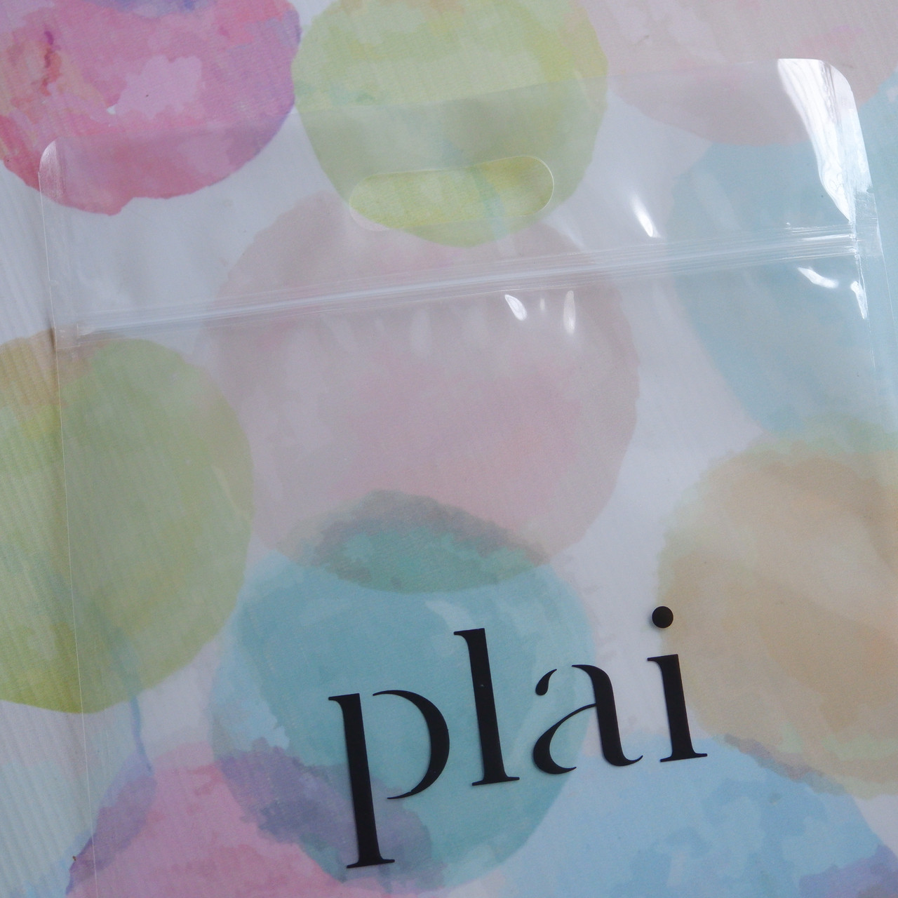 Паперові пакети з логотипом з ламінацією ціна виготовлення пакетів замовити Київ брендовані