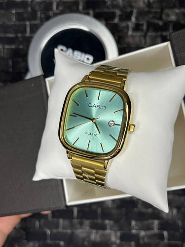 Наручний годинник Casio унісекс, золотисто-блакитний циферблат ...