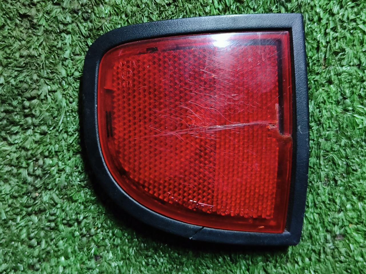 Катафот відбивач задній лівий Mitsubishi L200 (06-15) Л200 8355A015 ...